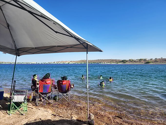 Sunlight dances across hidden coves where boaters discover private beaches accessible only by water—Lake Pleasant's most treasured secret spots.