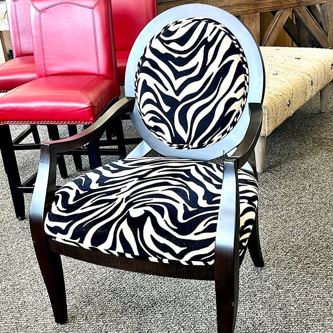 That zebra-print chair isn't just making a statement; it's delivering a full-blown speech about your excellent taste and willingness to embrace the wild side.