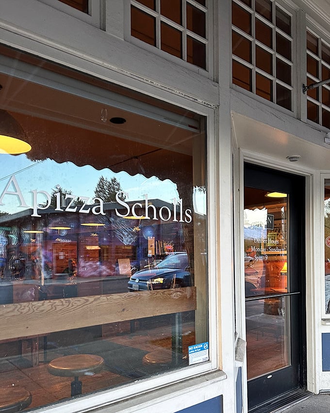 Simple storefront, serious pizza game – sometimes the best treasures come in unassuming packages.