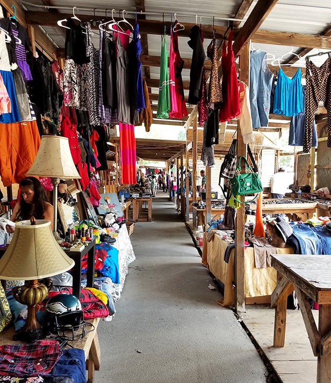 Colorful clothing lines the aisles at Bill's Flea Market, where treasures hang overhead and bargains wait around every corner.
