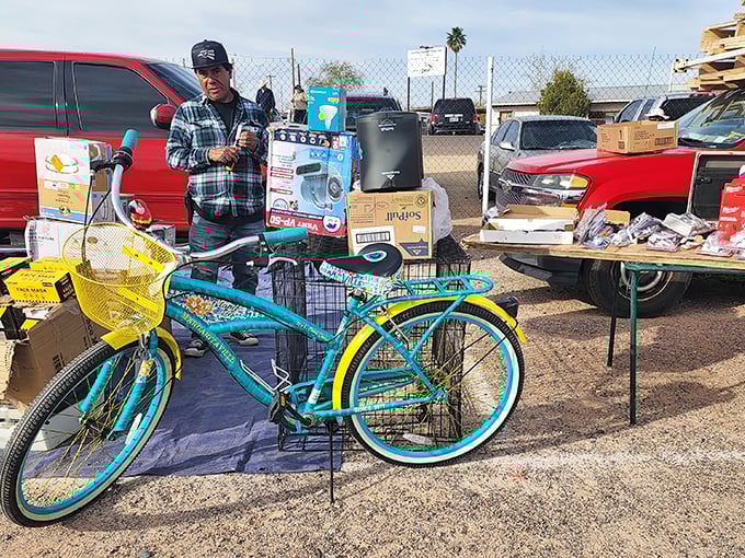 Early birds catch the deals! Morning light illuminates this outdoor swap meet where pickup trucks double as display cases for unexpected treasures.