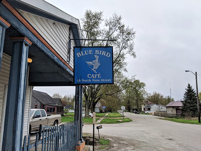 Blue plate special alert! Laketon's Blue Bird Café sign promises comfort food that'll transport you faster than Dorothy's ruby slippers to your grandmother's Sunday dinner table.