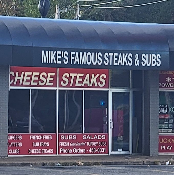 Bold red letters announce serious cheese steak territory - Mike's doesn't whisper about their sandwich superiority.