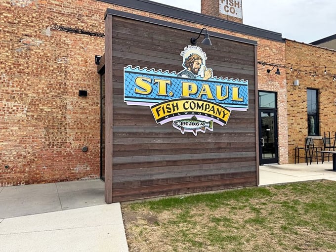 St. Paul Fish Company's wooden façade and brick wall combo—like a fisherman who dresses up but refuses to remove his lucky hat.