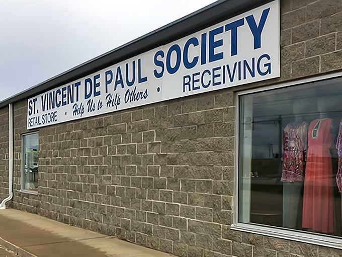St. Vincent de Paul Society's mission statement is right on the wall—"Help Us to Help Others"—thrifting with a purpose.