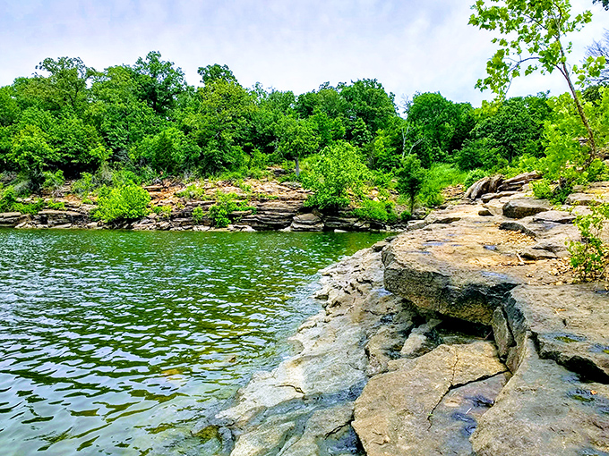 Crystal-clear waters reveal every secret below, like reading nature's diary through liquid glass windows.