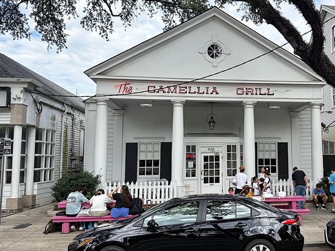 Southern charm on a plate! The Camellia Grill's stately white columns and picket fence make breakfast feel like a special occasion.
