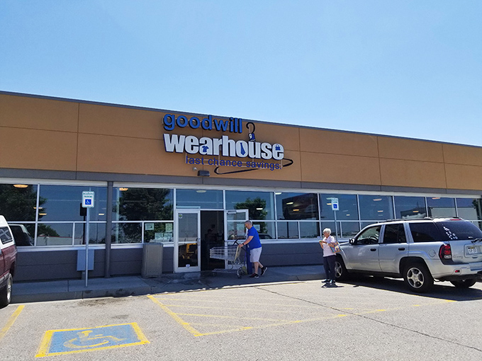 The Goodwill Wearhouse stands ready like a treasure chest waiting to spill its secondhand secrets.