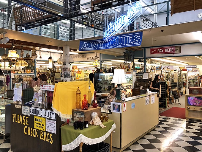 Antique Alley's multi-level wonderland invites serious browsing – the kind of place where hours disappear faster than cookies at a PTA meeting.