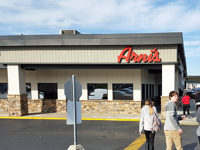 Simple brick and stone exterior, legendary pizza within – Arni's proves great food doesn't need flashy packaging to win hearts.