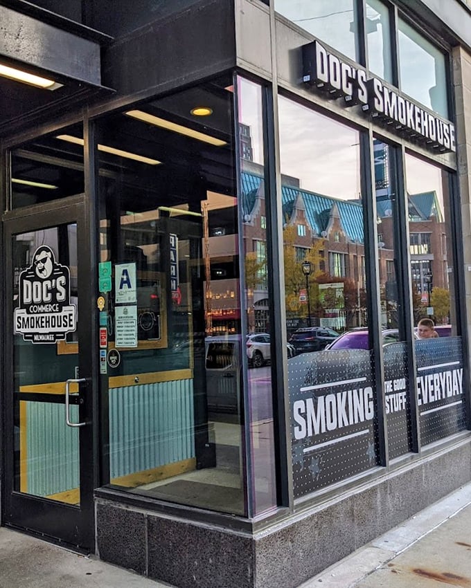 The entrance to DOC's promises "Smoking the Stuff Everyday" – a commitment to craft that shows in every bite.