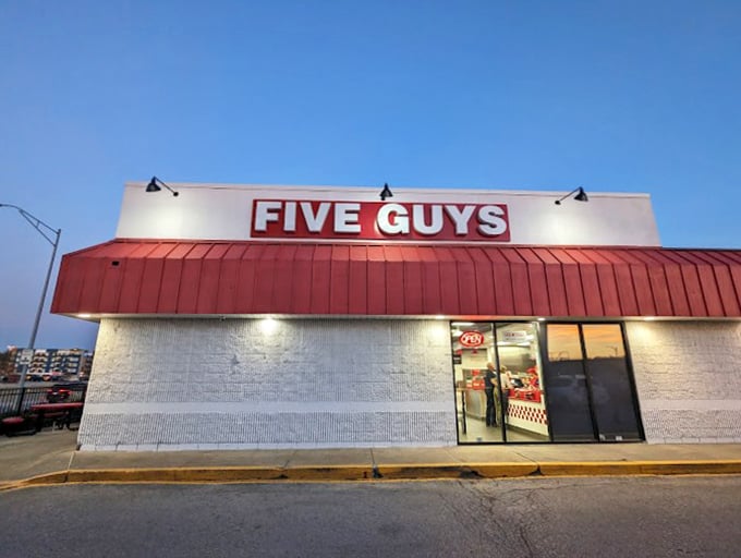 Five Guys after dark—where hot dog dreams come true. That glow is practically saying "Open sesame" to your appetite!