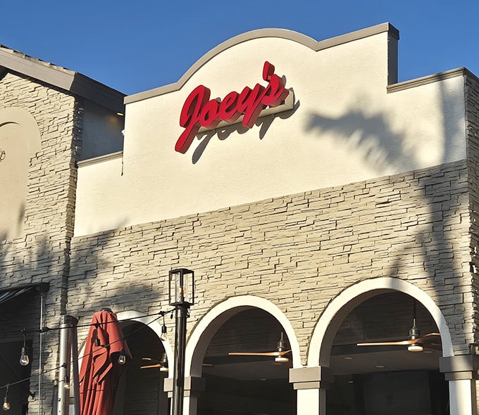 Elegant yet approachable, Joey's exterior hints at the culinary magic happening inside. Where pizza becomes an island celebration.
