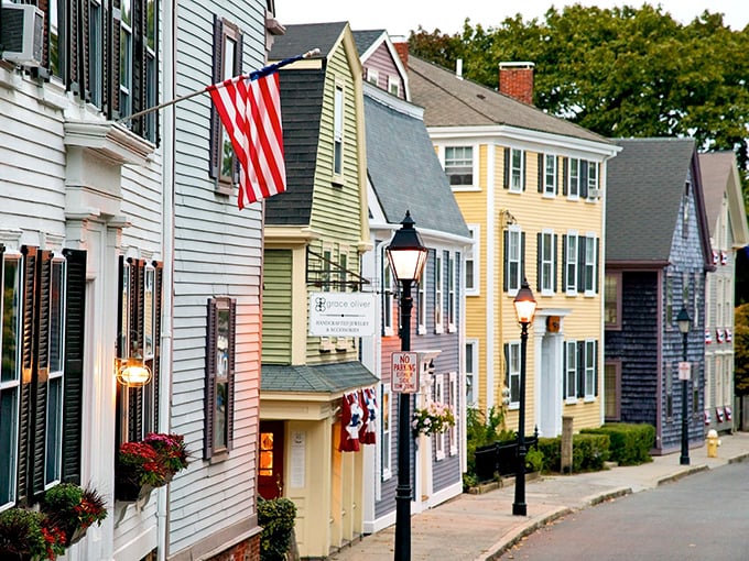 Colorful harbor houses create a rainbow of coastal living that makes every view postcard-worthy.
