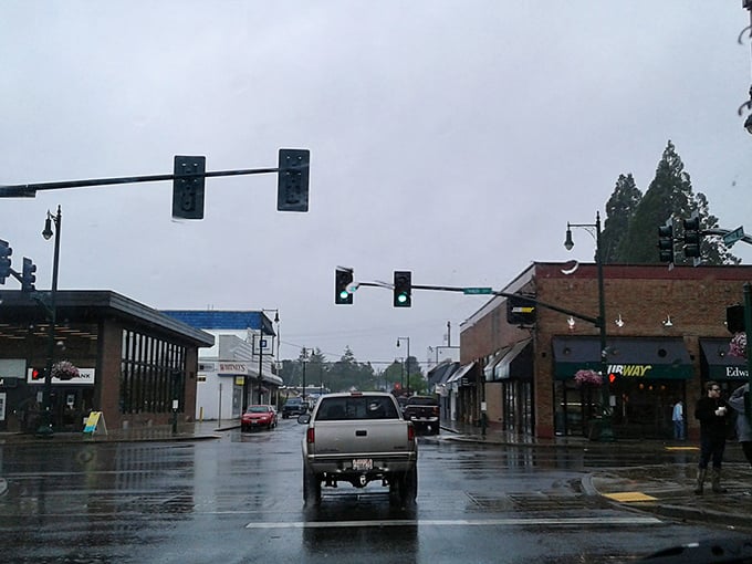 Rain-slicked streets of Montesano shimmer like the opening scene of a cozy mystery novel—complete with glistening pavement and secrets hiding behind storefront windows.