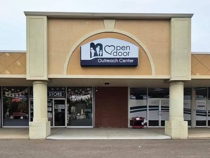 The elegant arched entrance makes thrift shopping feel like discovering hidden gems in an upscale treasure vault.