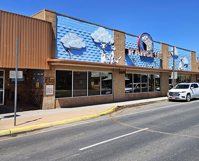 Blue skies, blue walls, and cartoon cows—Range Café's exterior is just the appetizer to the artistic feast waiting inside.