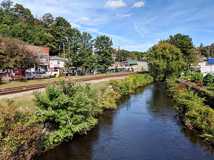 The peaceful Moosup River flows through Stafford Springs, creating a scenic backdrop for the small town's charming downtown area.