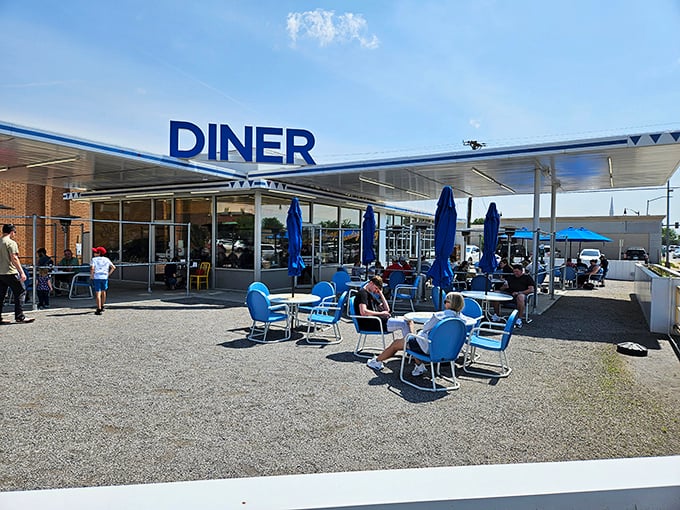 Blue skies and blue chairs—Sunnyside Diner's outdoor seating area invites you to linger over that second coffee.