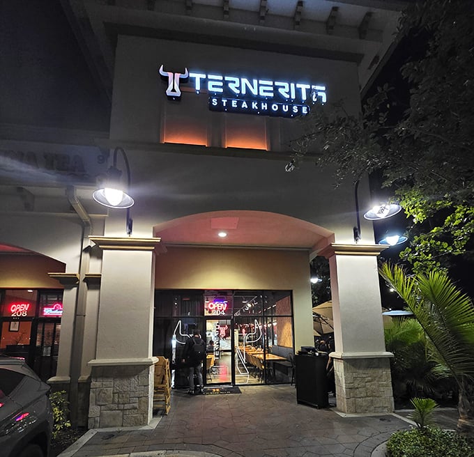 When the neon "OPEN" sign glows this bright, you know the grill inside is working overtime tonight.