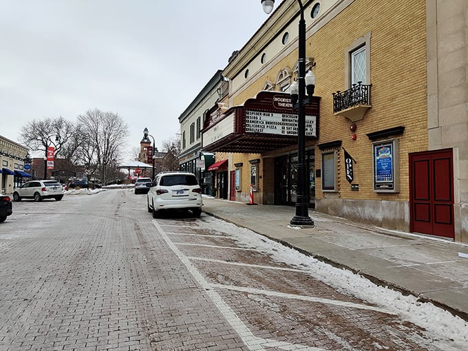 Winter's gentle dusting can't dim the spotlight! Woodstock's golden theater glows with promise of silver screen escapes when the weather outside is frightful.