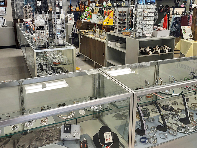 The jewelry counter gleams with possibility. Vintage brooches and modern bangles coexist like a multigenerational family reunion.
