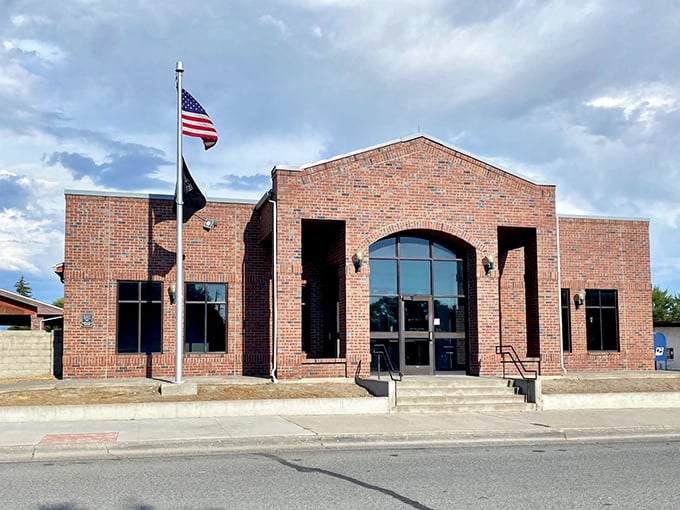 The Post Office brings a touch of modern brick architecture to town, proving government buildings don't have to look like they were designed by someone who hates windows.