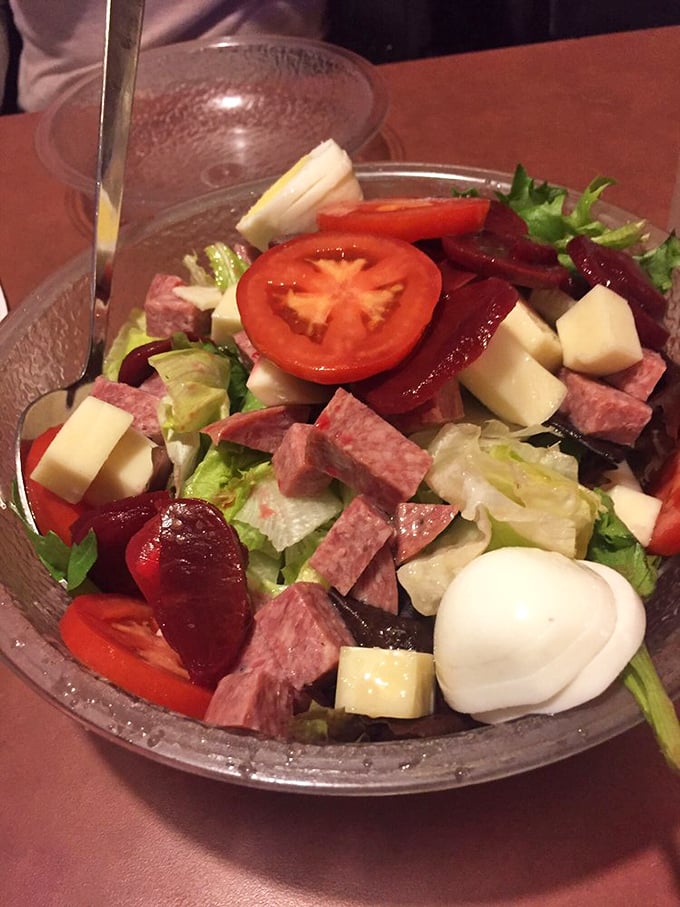 This antipasto salad isn't just a prelude—it's a symphony of Italian deli classics. Fresh mozzarella, salami, and that perfectly ripe tomato create the ideal pizza companion.