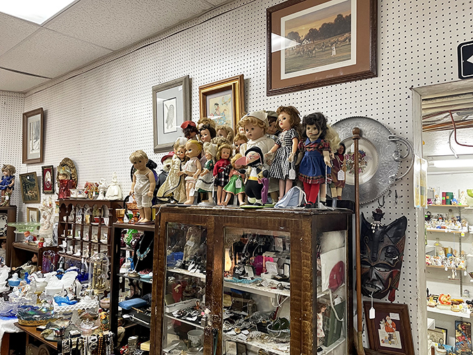 Dolls with stories to tell, perched on antique furniture like a tiny audience. Some find them charming, others slightly unnerving—there's no in-between.