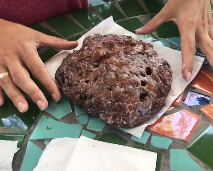 This apple fritter isn't just a donut – it's architecture. A glistening monument to what happens when apples, cinnamon, and dough meet destiny.
