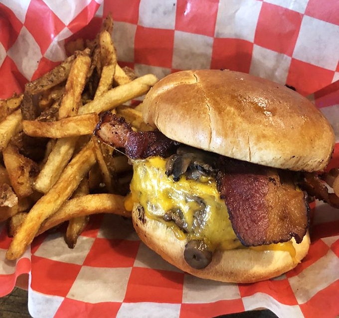 Bacon, cheese, and beef in perfect harmony—like a culinary jazz trio that knows exactly when to let each flavor solo.