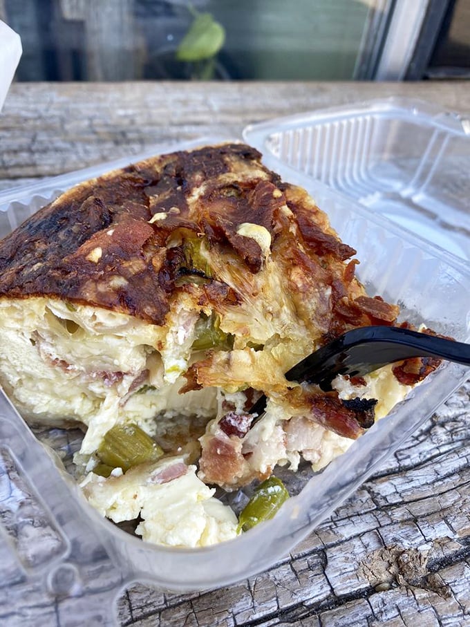 This isn't just quiche—it's architecture. Layers of egg, cheese, and vegetables in perfect structural harmony that would make Frank Lloyd Wright weep.