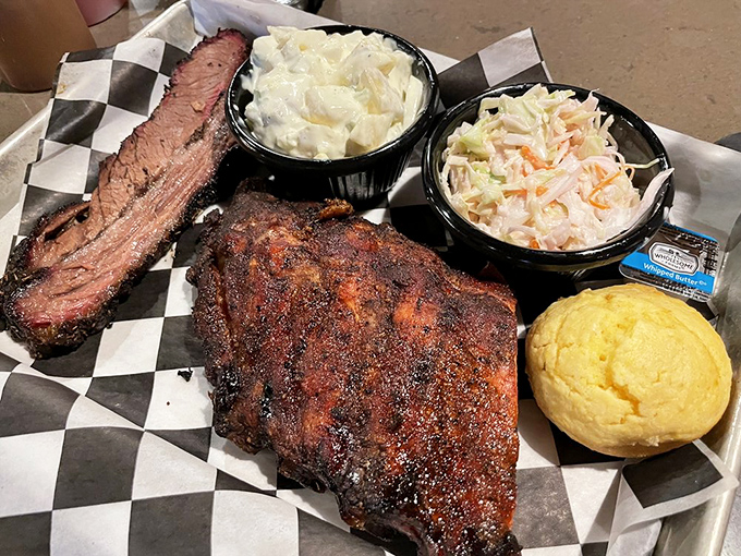 Brisket with that telltale smoke ring, mac and cheese that's actually cheesy, and cornbread that doesn't need butter (but get it anyway).