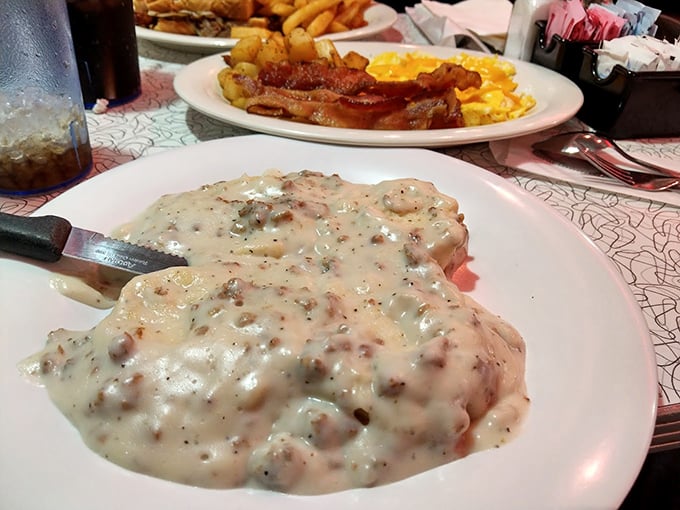 Biscuits and gravy that would make your Southern grandmother nod in approval—a creamy, peppery blanket of comfort.