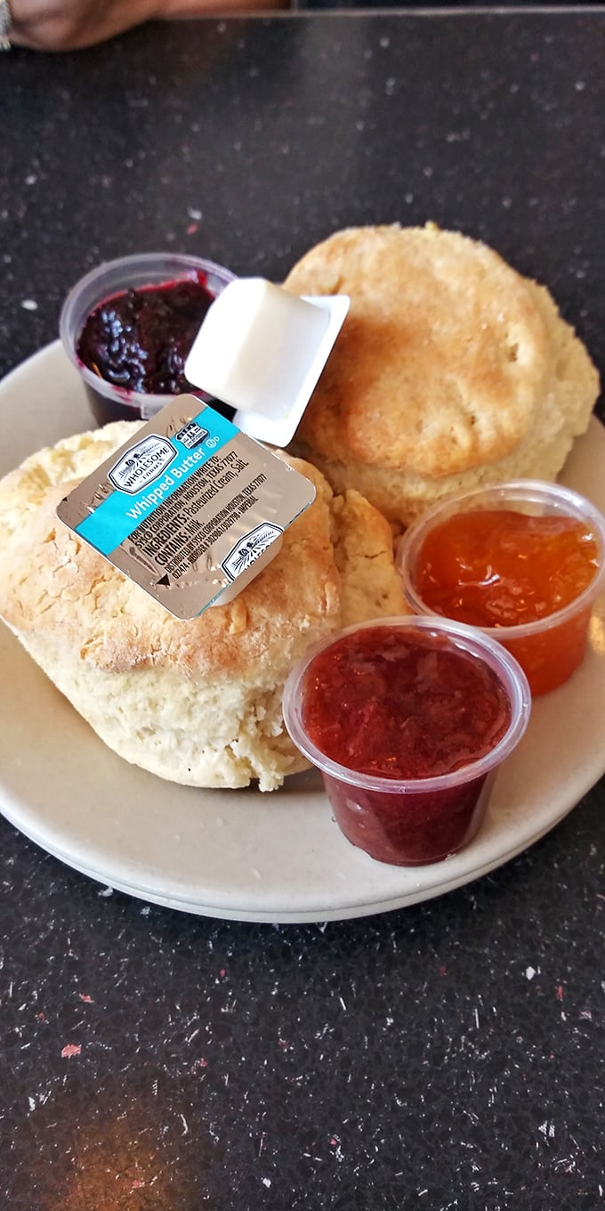 These aren't just biscuits—they're cloud-like vessels of buttery perfection, ready to be slathered with homemade jam that tastes like summer in a jar.