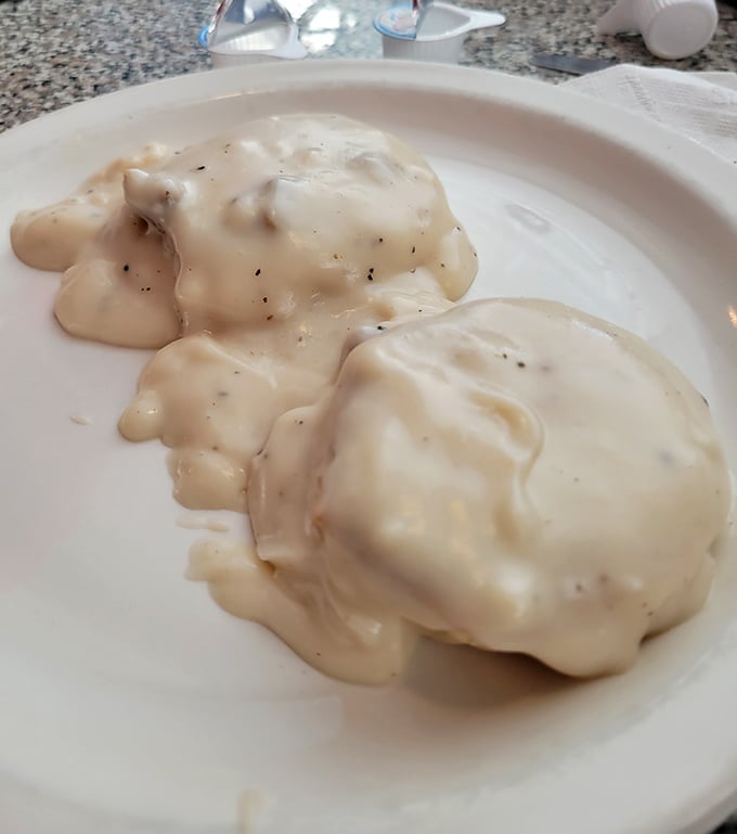 Fluffy biscuits swimming in creamy sausage gravy – proof that some things never go out of style.
