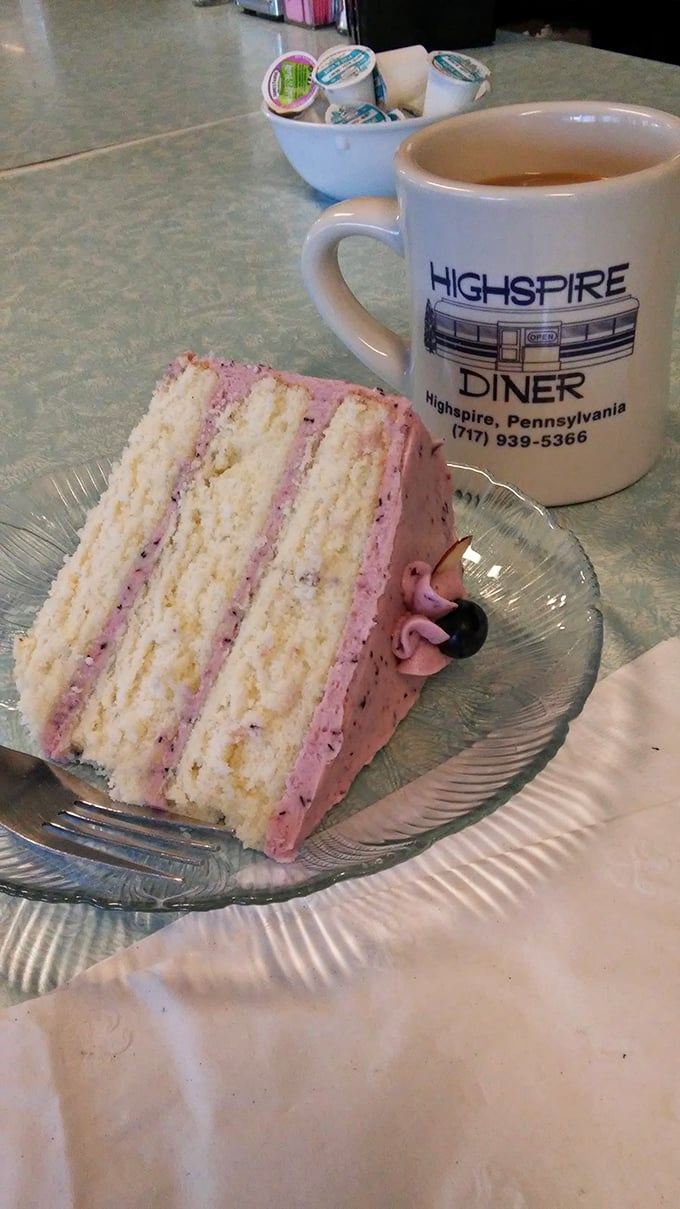 A slice of heaven with your coffee? This berry-infused layer cake and signature diner mug combo is worth every delicious calorie.