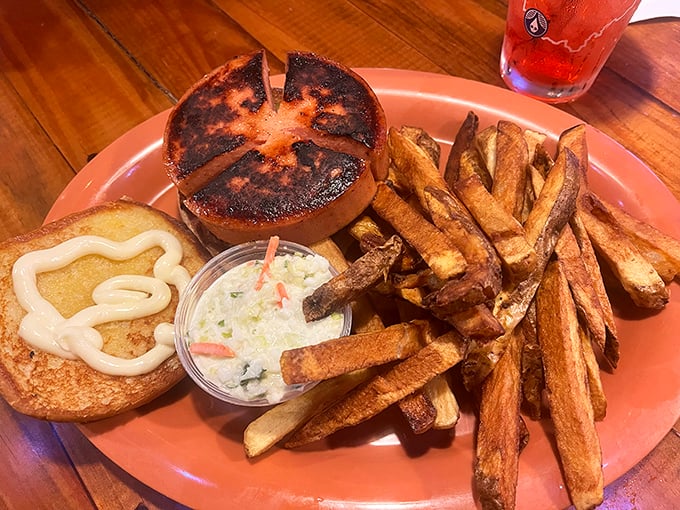 That perfectly grilled bun with a hint of char cradles comfort between bread. Those hand-cut fries aren't just a side—they're co-stars in this heartland feast.