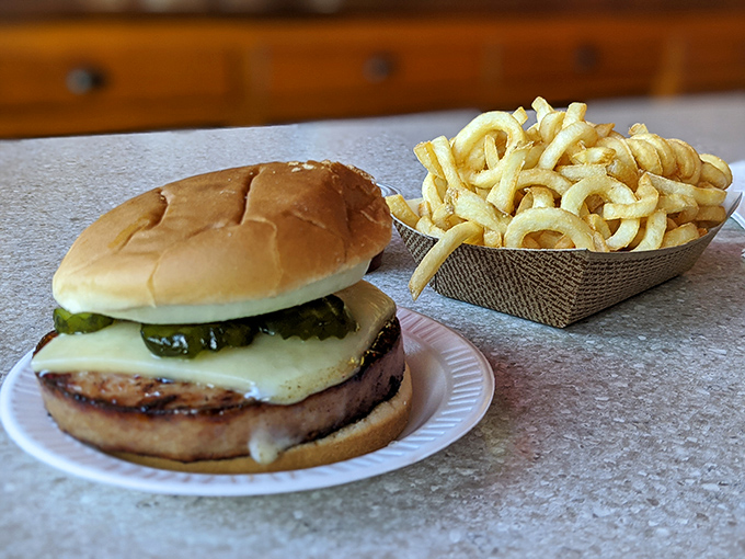 The famous bologna sandwich in all its glory – thick-cut, grilled to perfection, and topped with cheese and pickles. This isn't your lunchbox bologna.