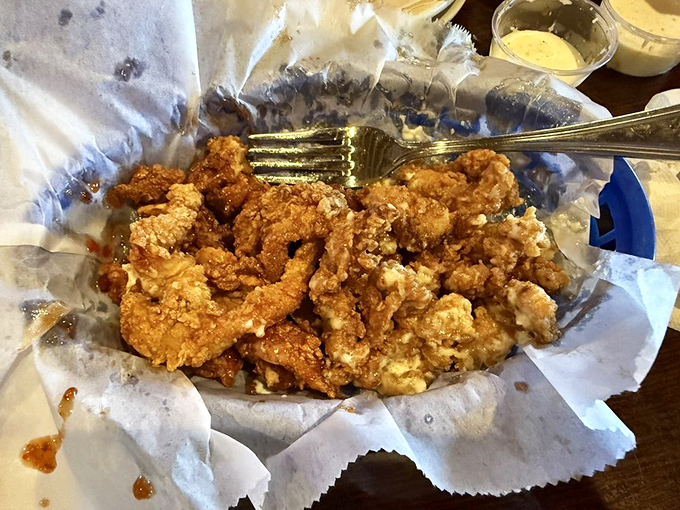 These boneless wings aren't just fried—they're transformed. Like Clark Kent stepping into a phone booth, but with more napkins required.