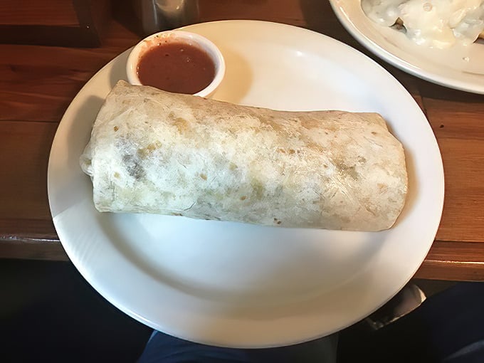 This breakfast burrito isn't messing around. Substantial enough to fuel a marathon, yet crafted with the care of someone who understands proper tortilla-to-filling ratios.