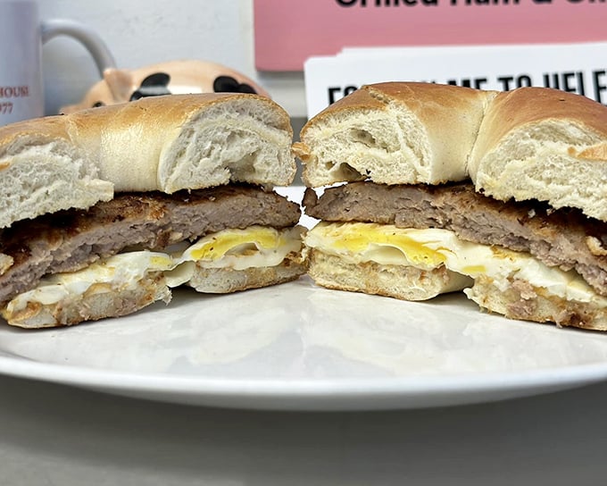 The breakfast sandwich cut in half reveals the perfect marriage of sausage and egg – a relationship counselor couldn't have matched these flavors better.