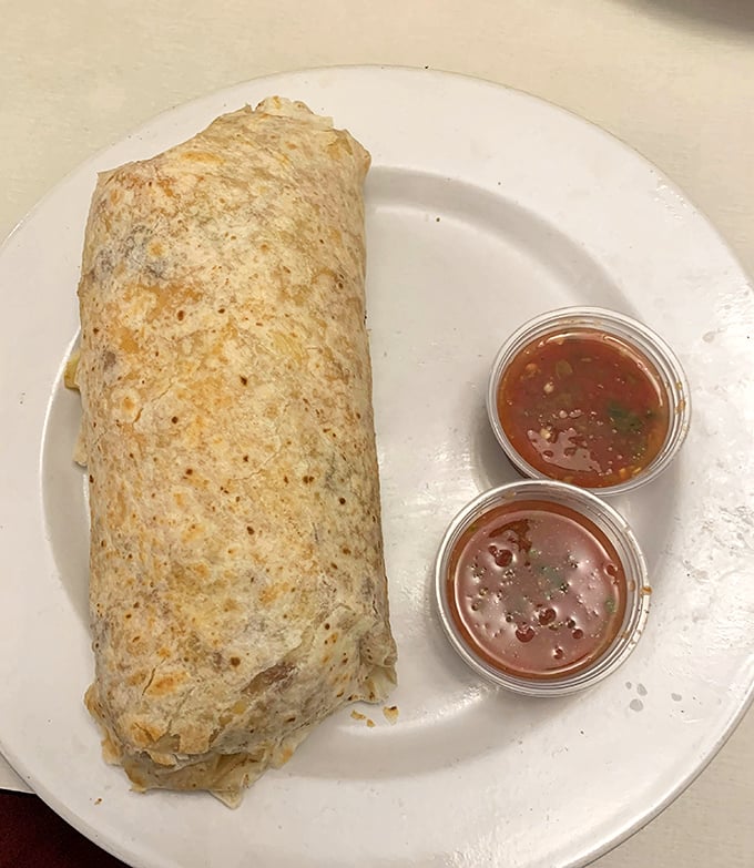 This breakfast burrito isn't just a meal—it's a commitment. Two salsas because life's too short for just one flavor profile.