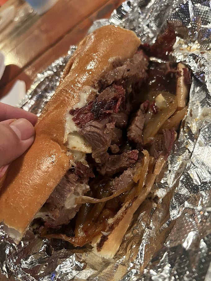 This brisket sandwich isn't just a meal – it's a commitment to excellence wrapped in foil, waiting to change your life.