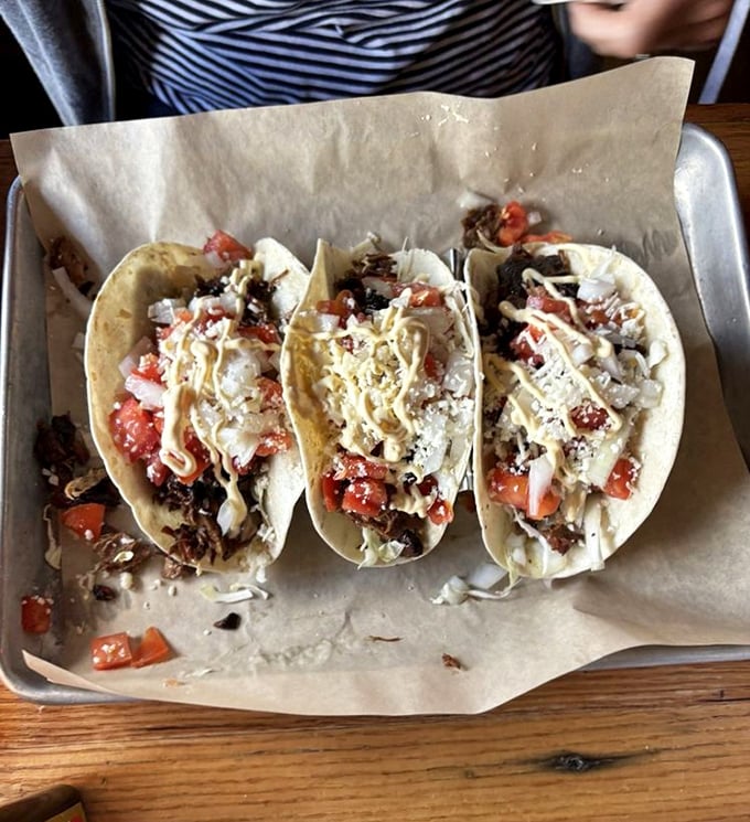 These aren't your average tacos—they're brisket-loaded flavor bombs topped with fresh pico and cheese that'll make you question all other tacos.