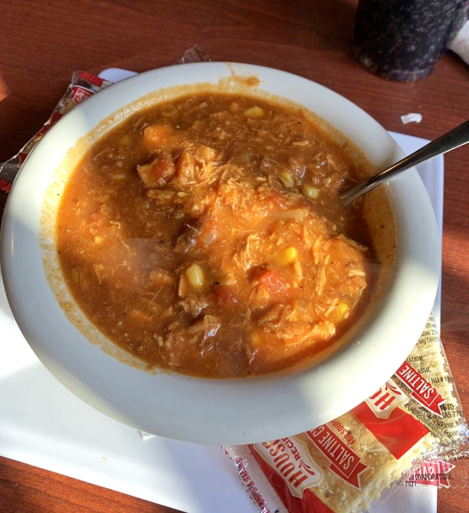 Brunswick stew that looks like it could sustain a small village through winter – hearty, rich, and worth the trip alone.