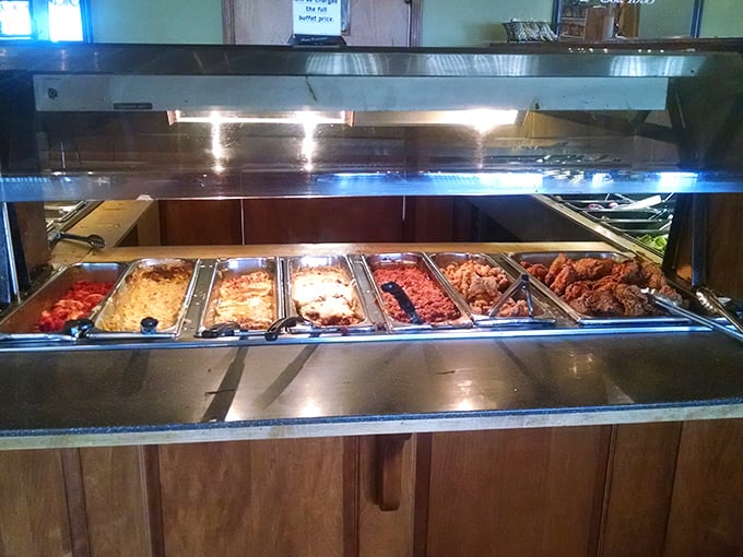 The hot buffet line—where diet plans go to die and food memories are born. That fried chicken has broken more New Year's resolutions than February.