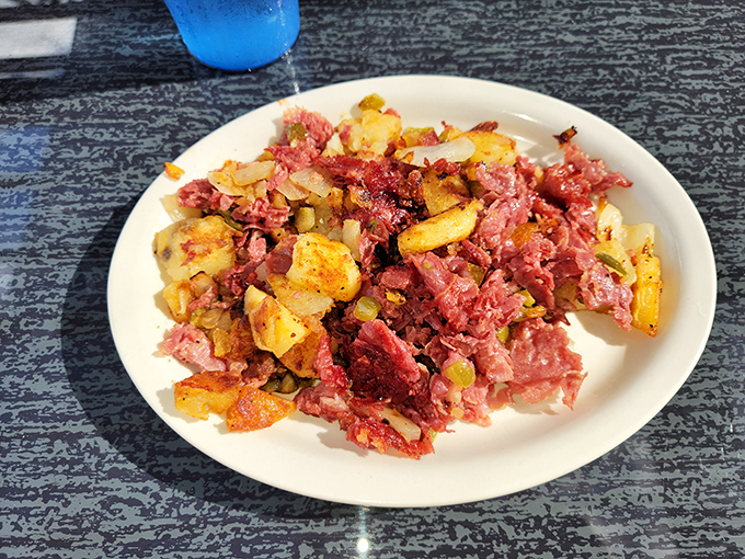 Corned beef hash that doesn't come from a can – a glorious jumble of crispy potatoes and savory meat that would make your grandmother nod in approval.