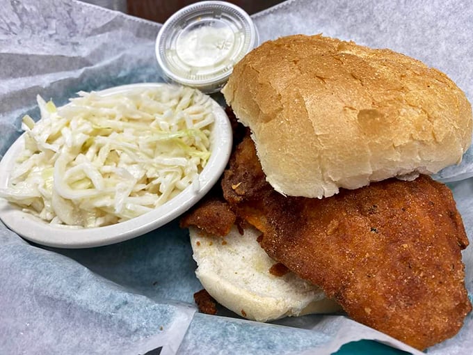 This fried fish sandwich doesn't just satisfy hunger—it creates memories. The crispy exterior gives way to flaky perfection inside.