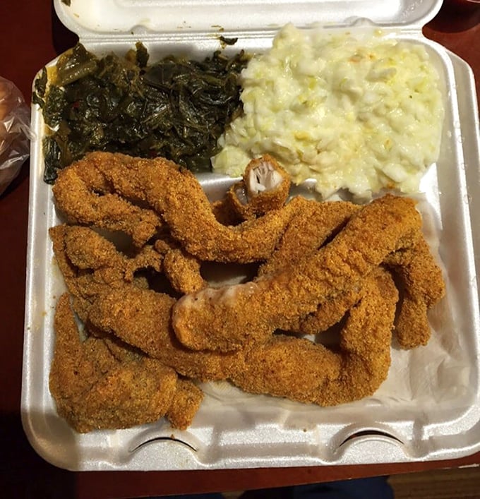 Catfish strips achieving that impossible perfect crunch while staying tender inside – this is the platonic ideal.